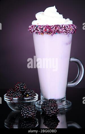 Delicious milk shake on dark green background Stock Photo - Alamy