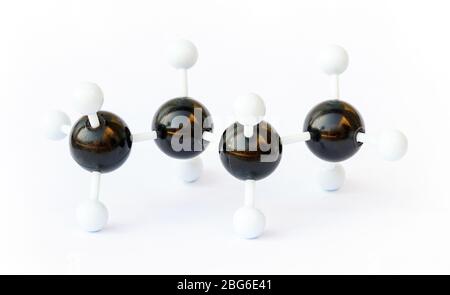 Plastic ball-and-stick model of a butane (chemical formula C4H8 ...