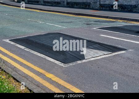 Rubber road bumps, humps in the middle of the road to reduce speed ...