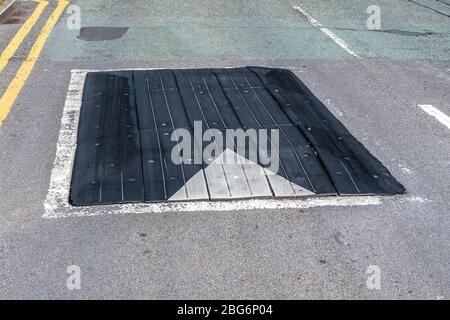 Rubber road bumps, humps in the middle of the road to reduce speed ...