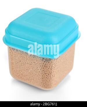 Dry yeast in container isolated on white Stock Photo - Alamy