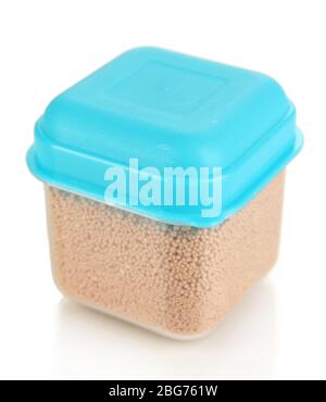 Dry yeast in container isolated on white Stock Photo - Alamy