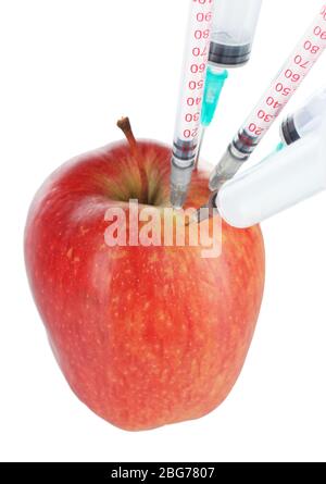 Injection into fresh apple isolated on white Stock Photo - Alamy