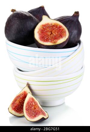Ripe figs in bowls isolated on white Stock Photo - Alamy