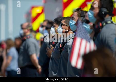 Firefighters with the Buda Fire Department stand at attention during ...