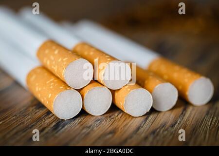 Close up of a hndmade smoking cigarettes on wooden background Stock ...