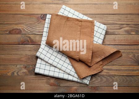 Clean napkins on wooden background Stock Photo - Alamy