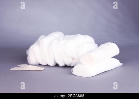 Wadding, bandage and patch on grey background Stock Photo - Alamy