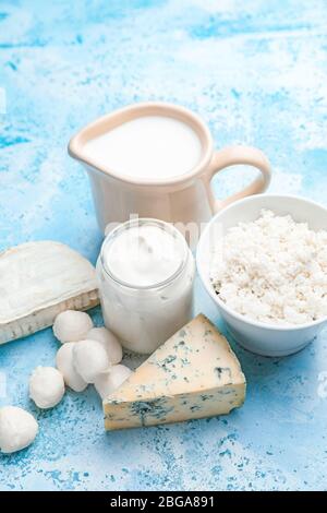Different dairy products on color background Stock Photo - Alamy