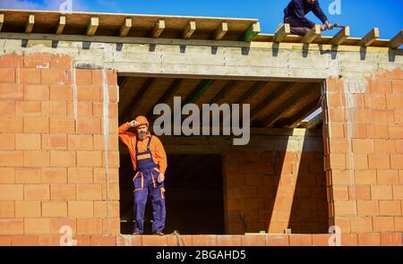 smoking cigarette on construction site Stock Photo - Alamy