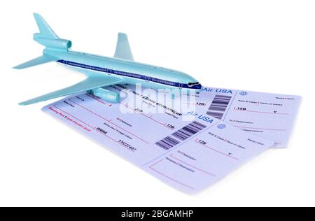 Airline tickets isolated on white Stock Photo - Alamy
