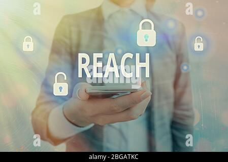 Conceptual hand writing showing Reach. Concept meaning the distance ...