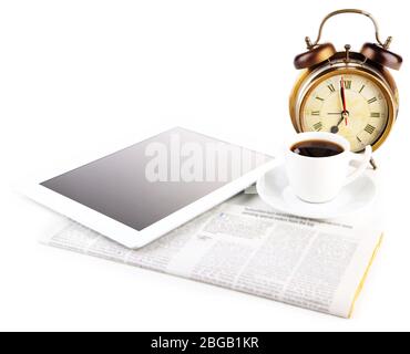 Tablet, newspaper, cup of coffee and alarm clock, isolated on white ...