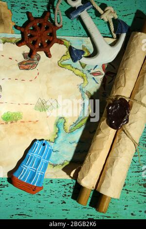 Treasure map with sea accessories, on wooden background Stock Photo - Alamy