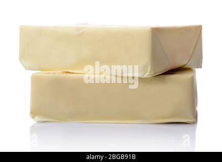 wrapped butter sticks isolated on white background Stock Photo - Alamy