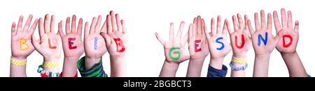 Kids Hands Holding Word Bleib Gesund Means Stay Healthy, Blue Sky Stock ...