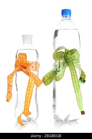 Water bottles with tape measure Stock Photo - Alamy