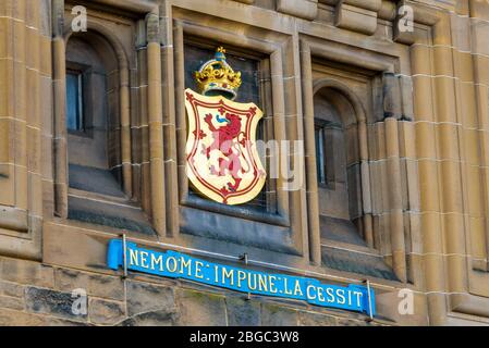 Latin motto 'Nemo me impune lacessit' with unicorn on a shield ...