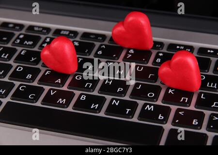 Red hearts on computer keyboard close up Stock Photo - Alamy