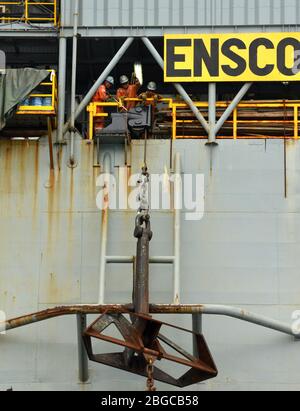 Industrial offshore anchor handling supply vessel sailing in open sea ...