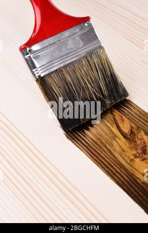 Applying protective varnish to wooden board close-up Stock Photo - Alamy