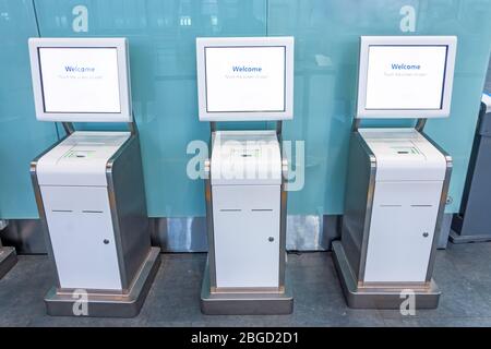 Self-service airline check-in desk boarding pass printers at London ...