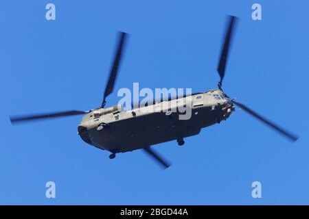 A twin rotor RAF Chinook helicopter flying over Leeds Stock Photo - Alamy