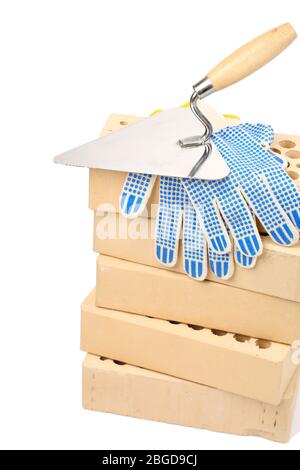 New bricks and building tools, isolated on white Stock Photo - Alamy