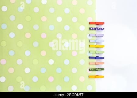 Abstract background with colorful wooden pins and paper Stock Photo - Alamy