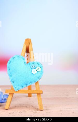 Beautiful heart small decorative easel on grey background Stock Photo ...