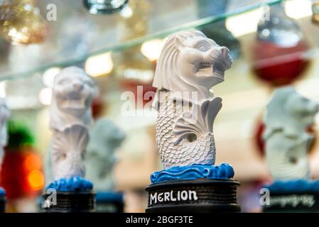Singapore, Oct 2019: Singapore Merlion figurines in souvenir shop. Mini ...