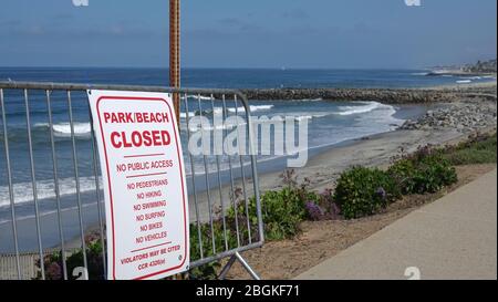 Sign and fences restrict access to all public beaches due to Covid-19 ...