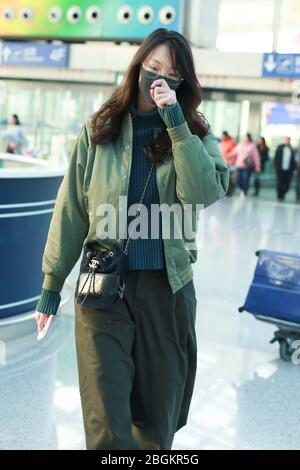 Former female Chinese volleyball player Hui Ruoqi arrives at a Beijing ...