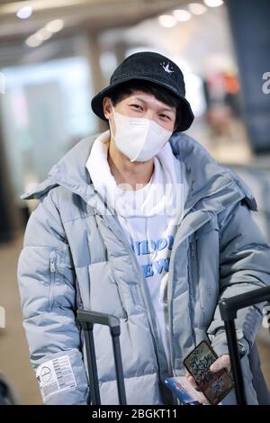 Chinese singer Charlie Zhou Shen arrives at a Shanghai airport after ...