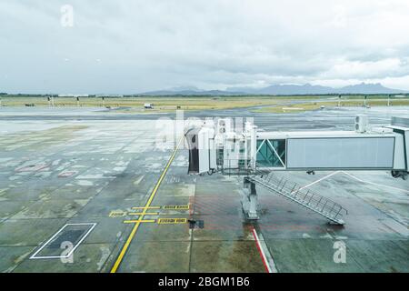 Skybridge passenger boarding bridge at airport Stock Photo - Alamy