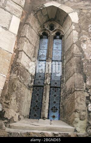 Windows of the medieval Corvin Castle in Hunedoara, Romania Stock Photo ...
