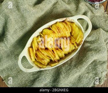 Crispy Leaf Potatoes -Best Roasted Potatoes Ever, sliced potatoes in a ...