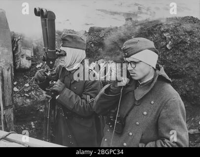 German soldiers at an observation post in the trenches on the Eastern ...