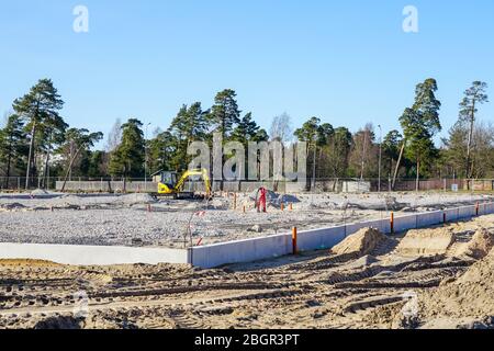Concrete construction of basement of large building. Panorama inside ...