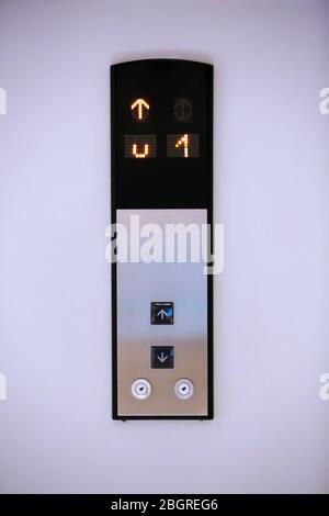 Modern metallic elevator with call button panel Stock Photo - Alamy
