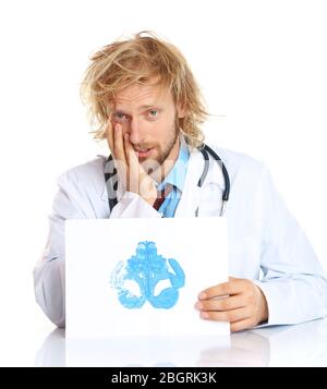 Funny psychotherapist holding Rorschach test Stock Photo - Alamy