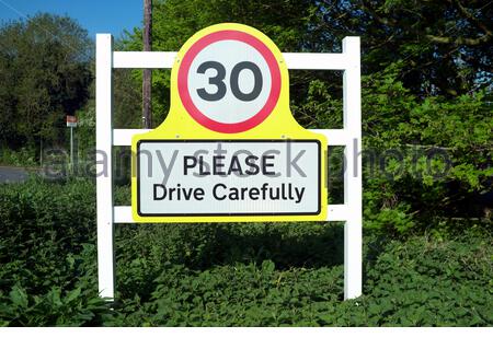 30 miles per hour speed limit sign at the entrance to the village of ...