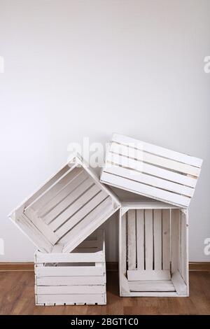 Empty wooden crates in room Stock Photo - Alamy