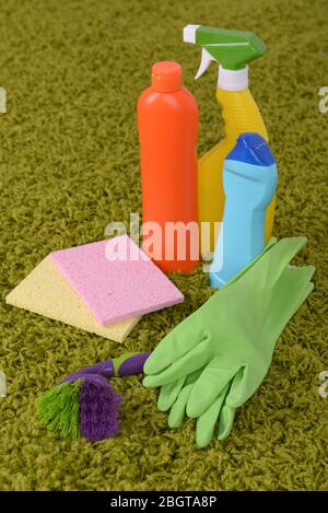 Cleaning items on carpet close up Stock Photo - Alamy