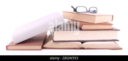 Books in a mess and glasses isolated on white Stock Photo - Alamy