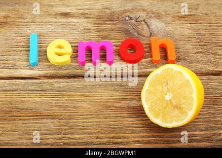 Lemon word formed with colorful letters on wooden background Stock ...