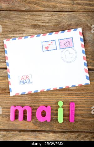 Mail word formed with colorful letters on wooden background Stock Photo ...
