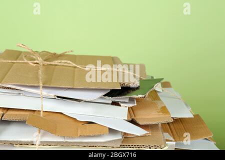 Big stack of papers on green background, close-up Stock Photo - Alamy