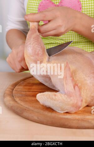 Woman preparing chicken, close-up Stock Photo - Alamy
