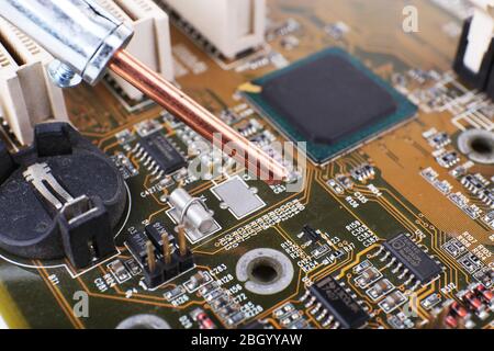 Repairing of computer motherboard, macro view Stock Photo - Alamy